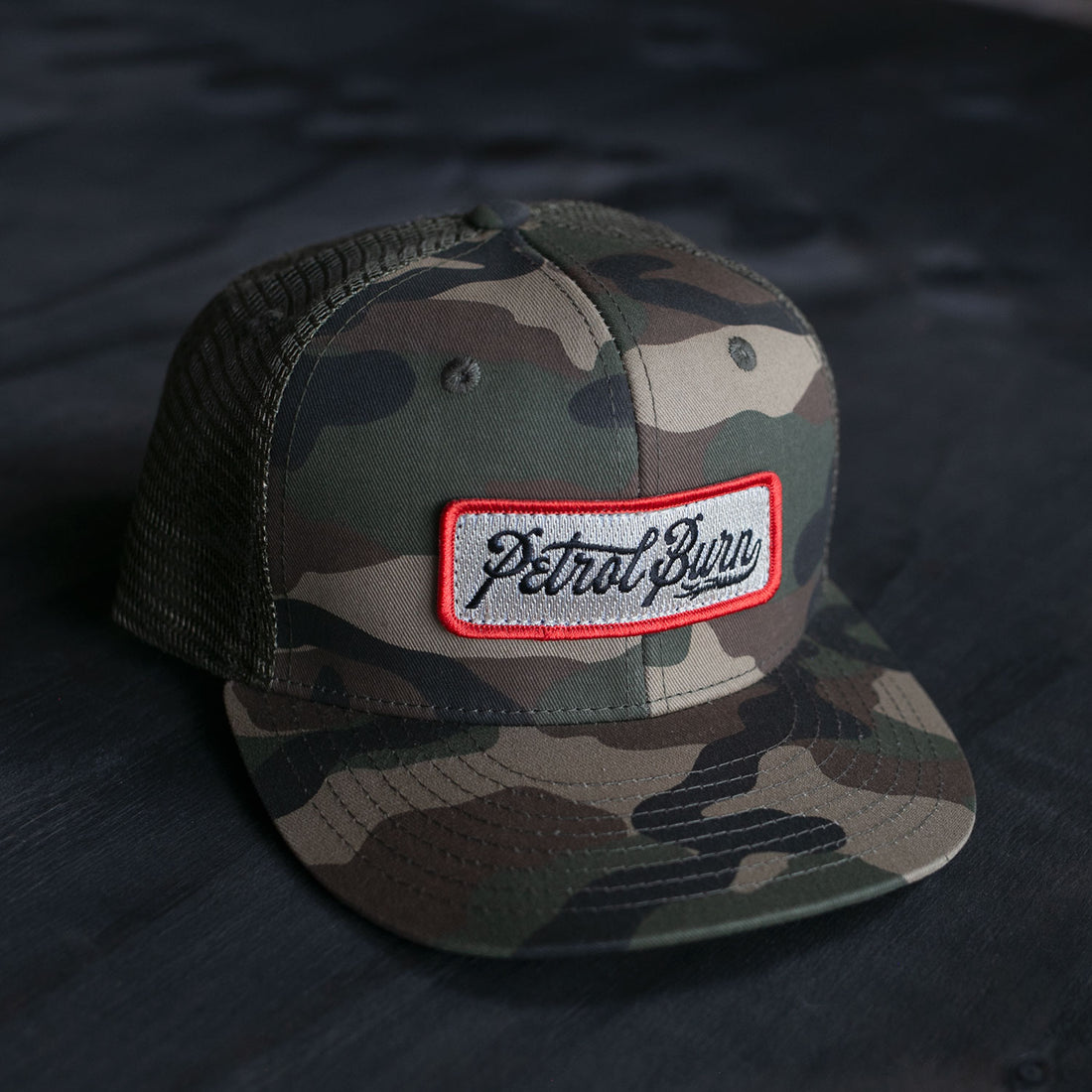 "Burn Logo" CAMO Petrol Burn Moto & Automotive Lifestyle Trucker Hat ...